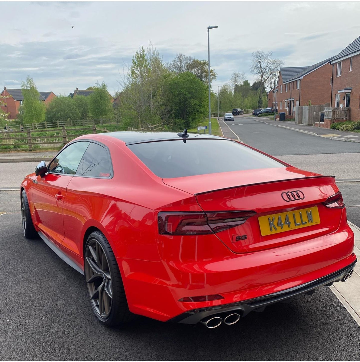 Red Audi S5 with some legal 3D gel plates – Delta Plates